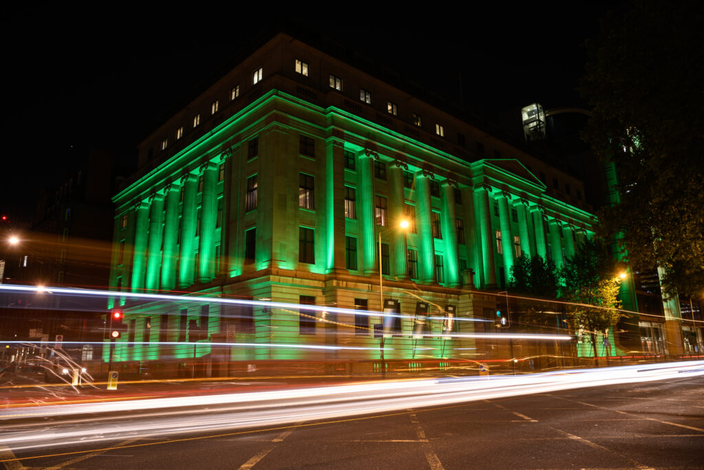 Why Are Some Buildings Lit Up Green In Colorado? - KOSI 101.1